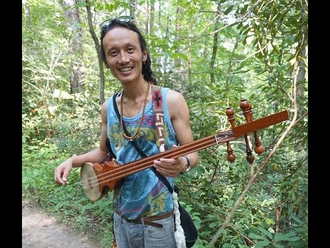 A Tibetan Man Demonstrates A Dranyen (aka Dramyin) - YouTube