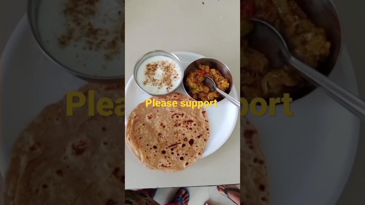 today's breakfast thali is masala lachha paratha with curd and locky ...