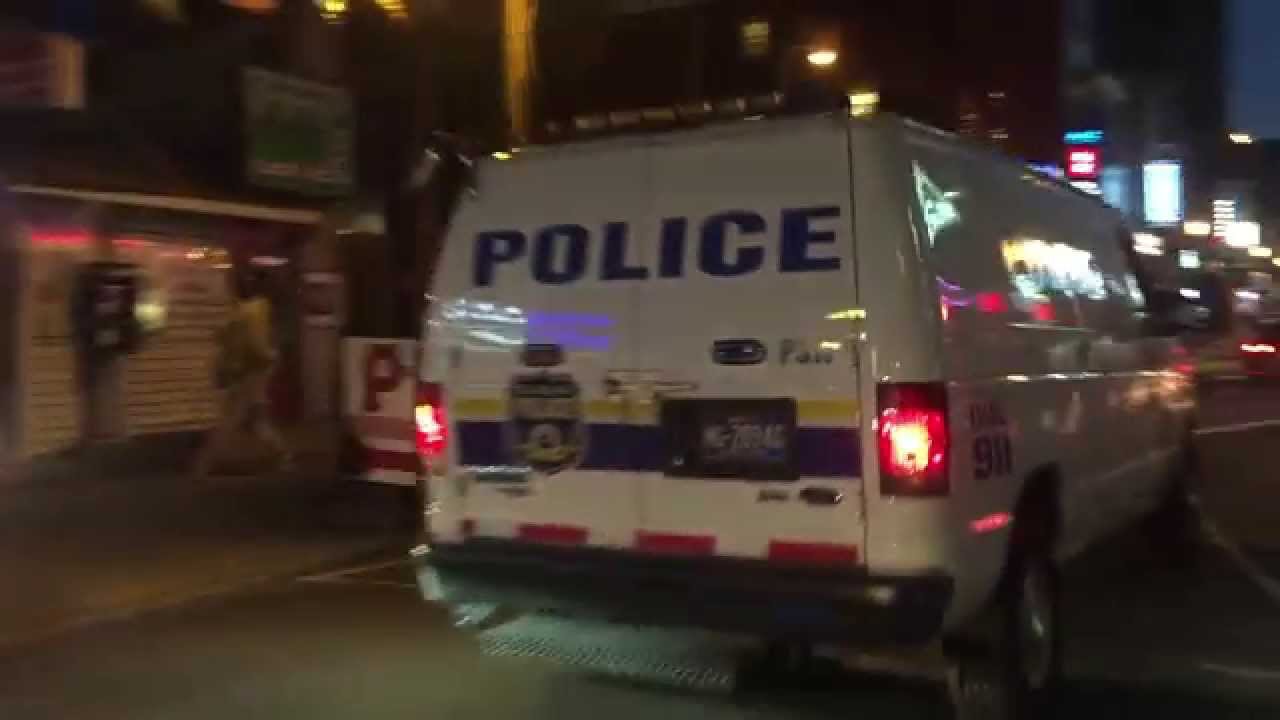 PHILADELPHIA POLICE DEPARTMENT VAN PATROLLING ON 10TH ST. IN CHINATOWN ...