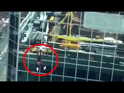 Video shows worker dangling from crane at Toronto construction site ...