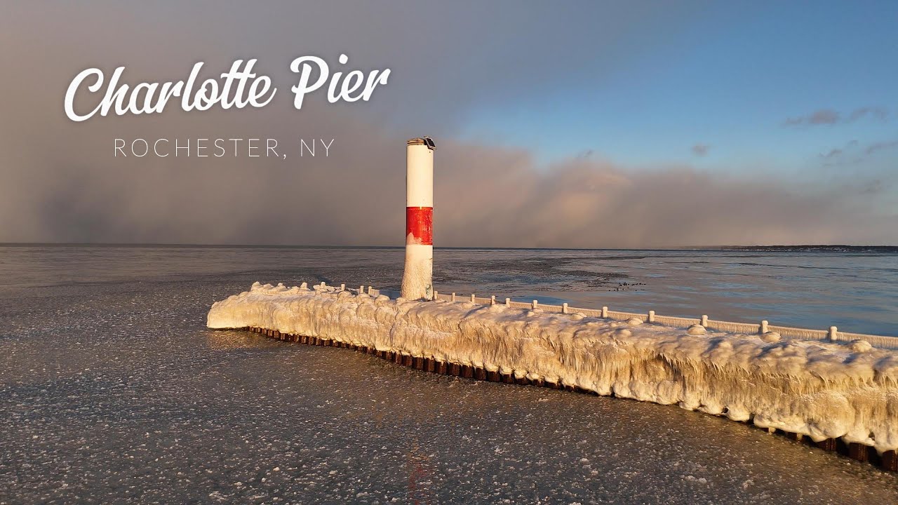 Flying over The Frozen Charlotte Pier, Located In Ontario Beach Park ...