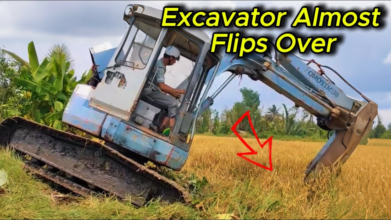 Excavator Almost Flips Over in the Rice Field! - YouTube