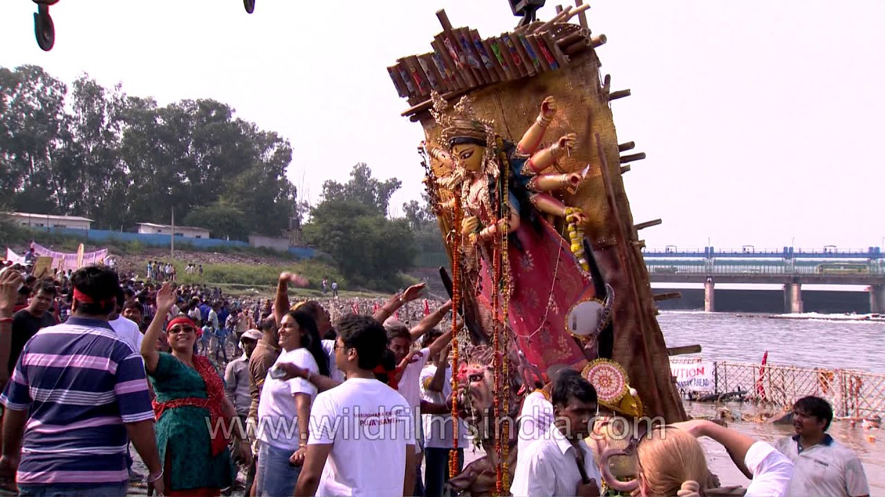 Durga Idol into the water- Durga Puja Visarjan - YouTube