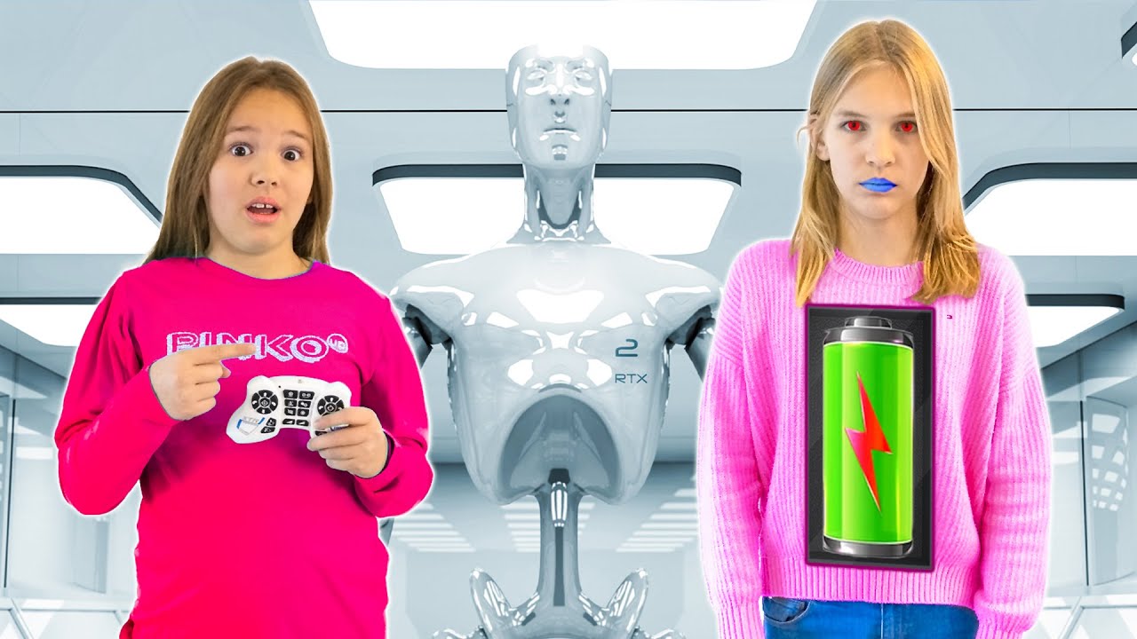 Amelia and Avelina play with a friendly robot - YouTube
