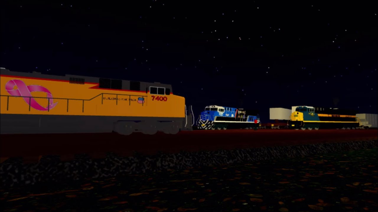 UP 7400 "Breast Cancer Awareness" ES44AC leads CSX Train - YouTube