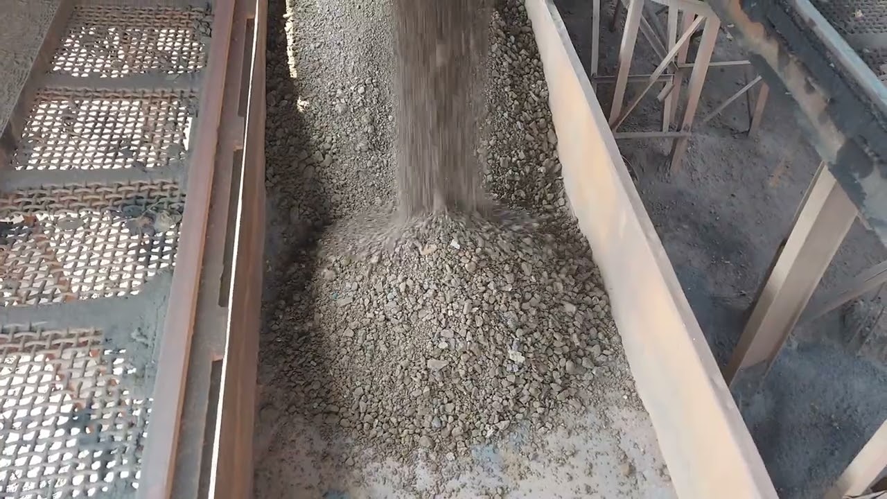 Iron ore lump loading in rail wagons with wagons moving - YouTube