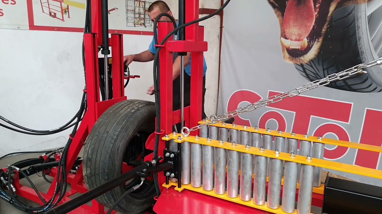 COT-9 hydraulic tyre tripling machine - packing car tyres into car ...