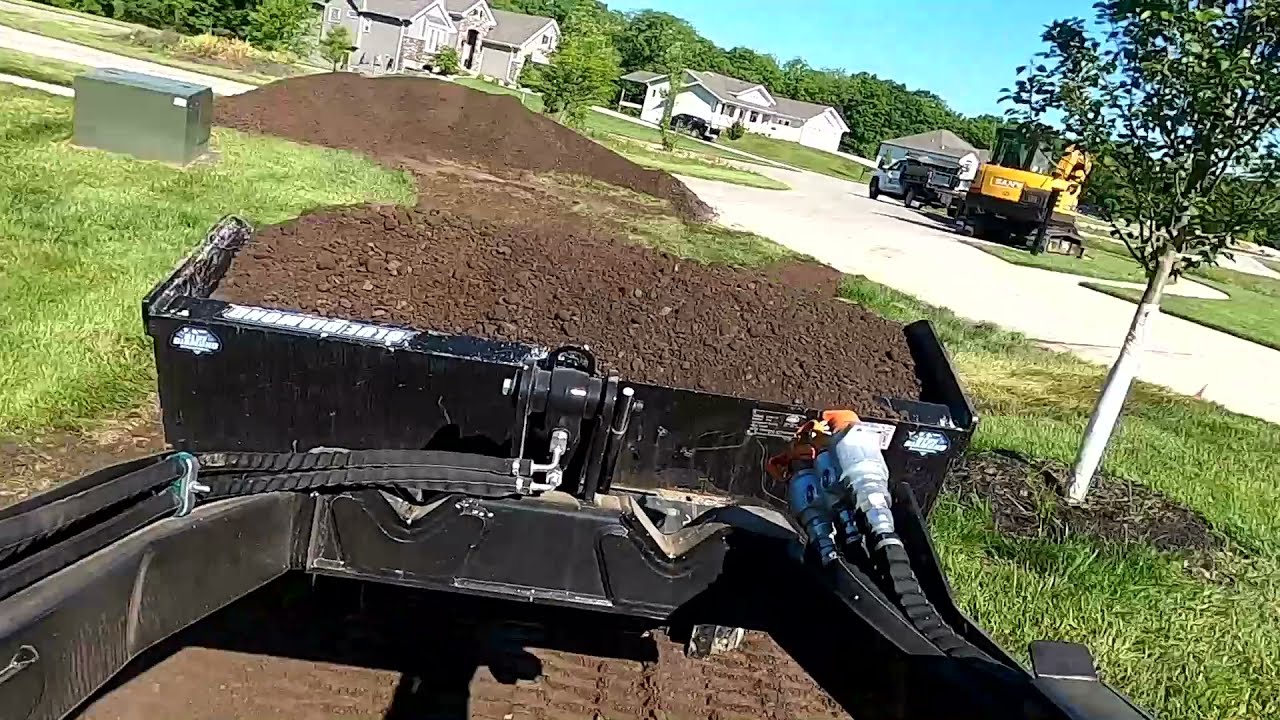 Grading with Ditch Witch 1550! Finishing up the Retaining Wall! - YouTube