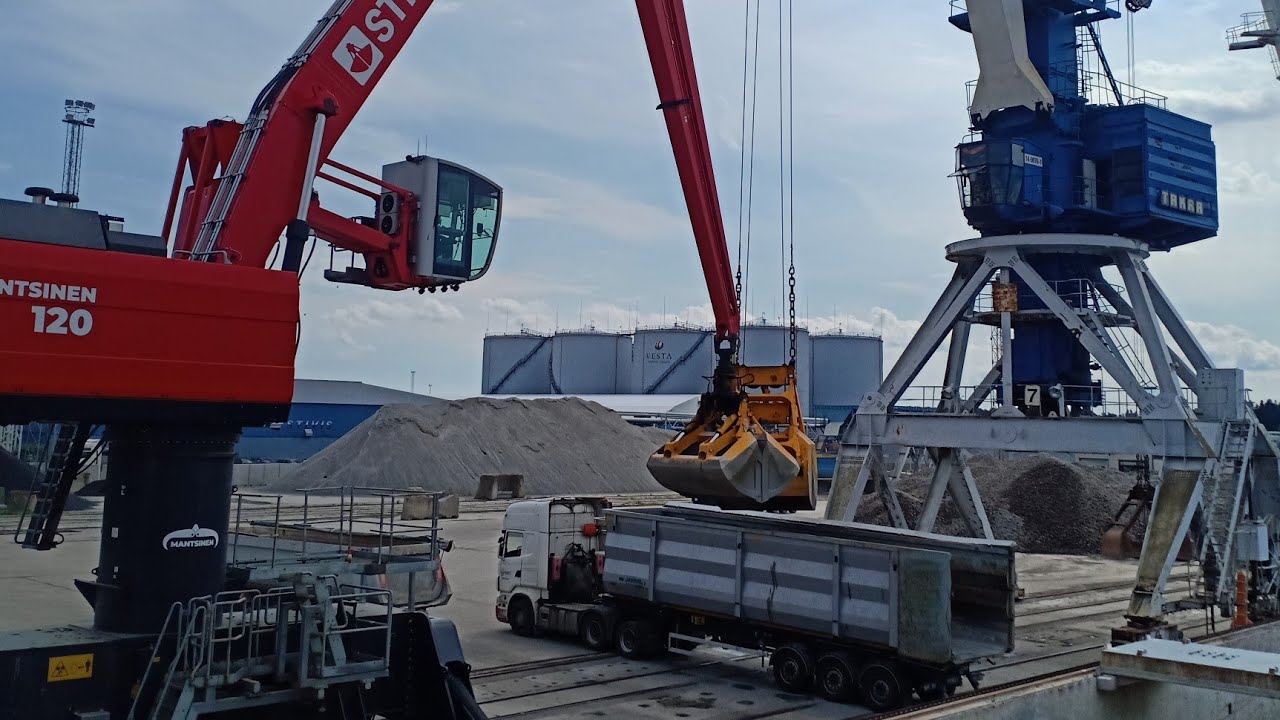 shore excavator loading cargo by shore truck loading cargo stone 3900 ...