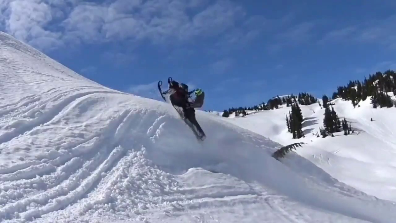 Backcountry snowmobiling jumps and drops - YouTube