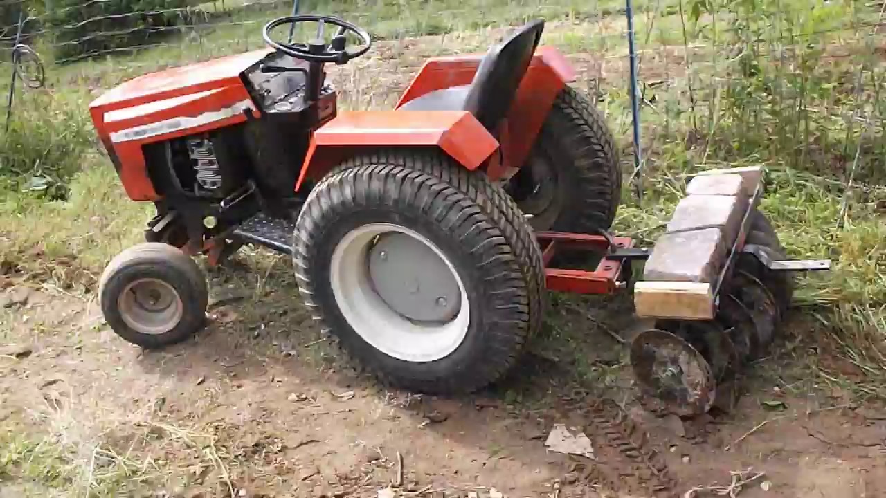 Case 446 with Brinly disc disking garden - YouTube