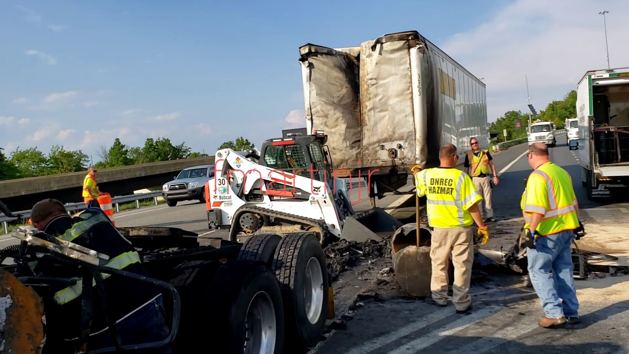 Tow company and State scientists work on truck fire removal and clean ...