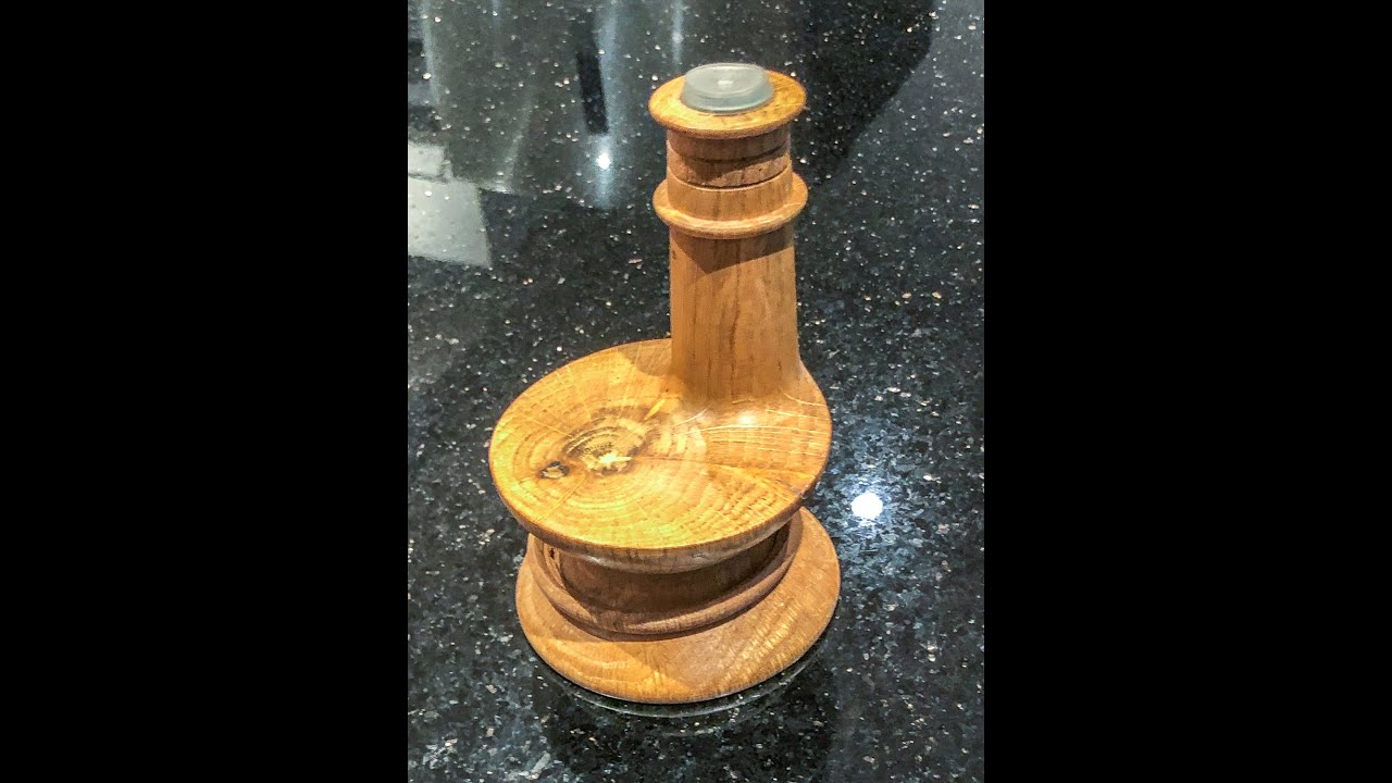 Woodturning a bud vase with offset stem and a captive ring - YouTube