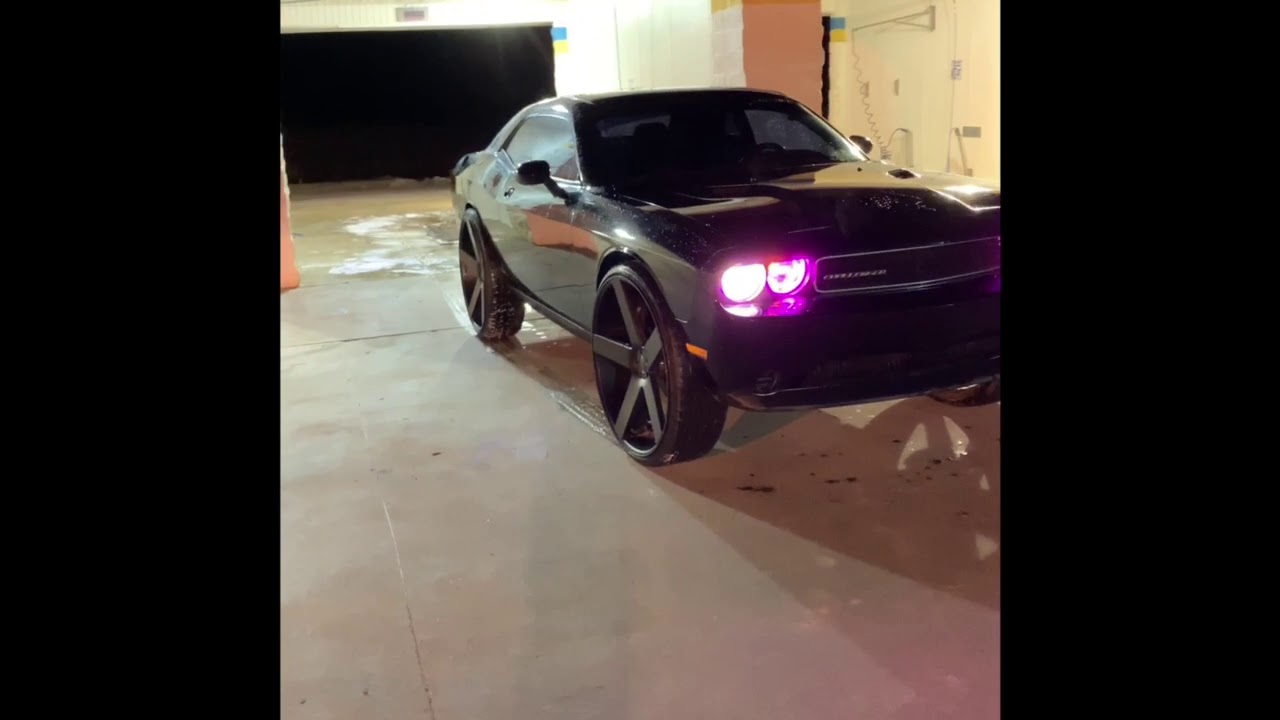 challenger lifted on 30” dub ballers walk around - YouTube