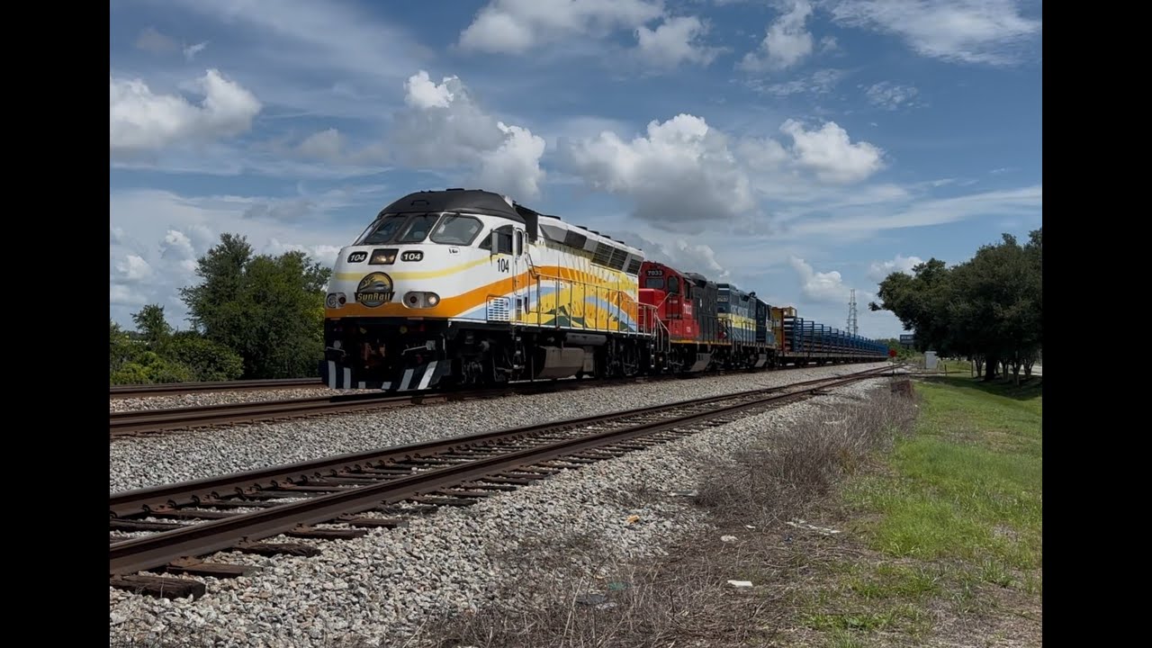 Catching the Sunrail welded rail train at Taft FL - YouTube