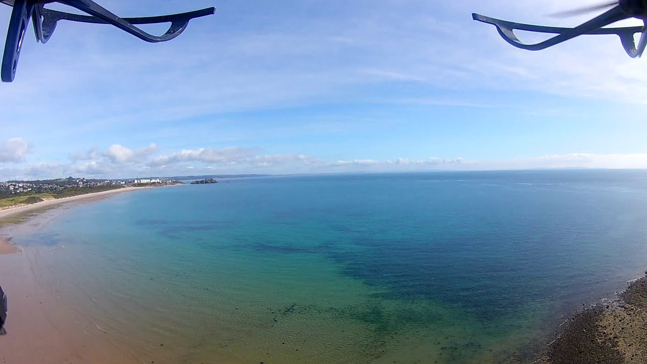 Elevated view of Tenby South Beach drone - YouTube