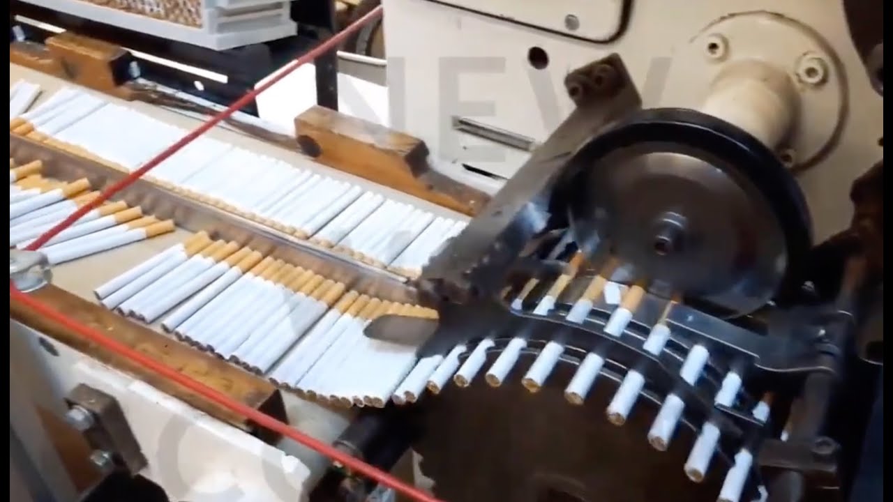 Cigarettes-How It Is Made, real shot of the production line of a large ...