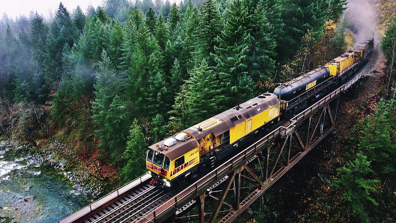 LORAM RAIL GRINDER WORKING & TRAINS FOLLOWING THRU THE FRASER CANYON ...