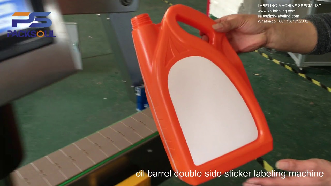 oil barrel double side sticker labeling machine - YouTube