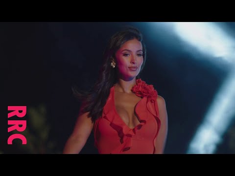 Maya Jama @slow-mo walk, in deep scoop neckline