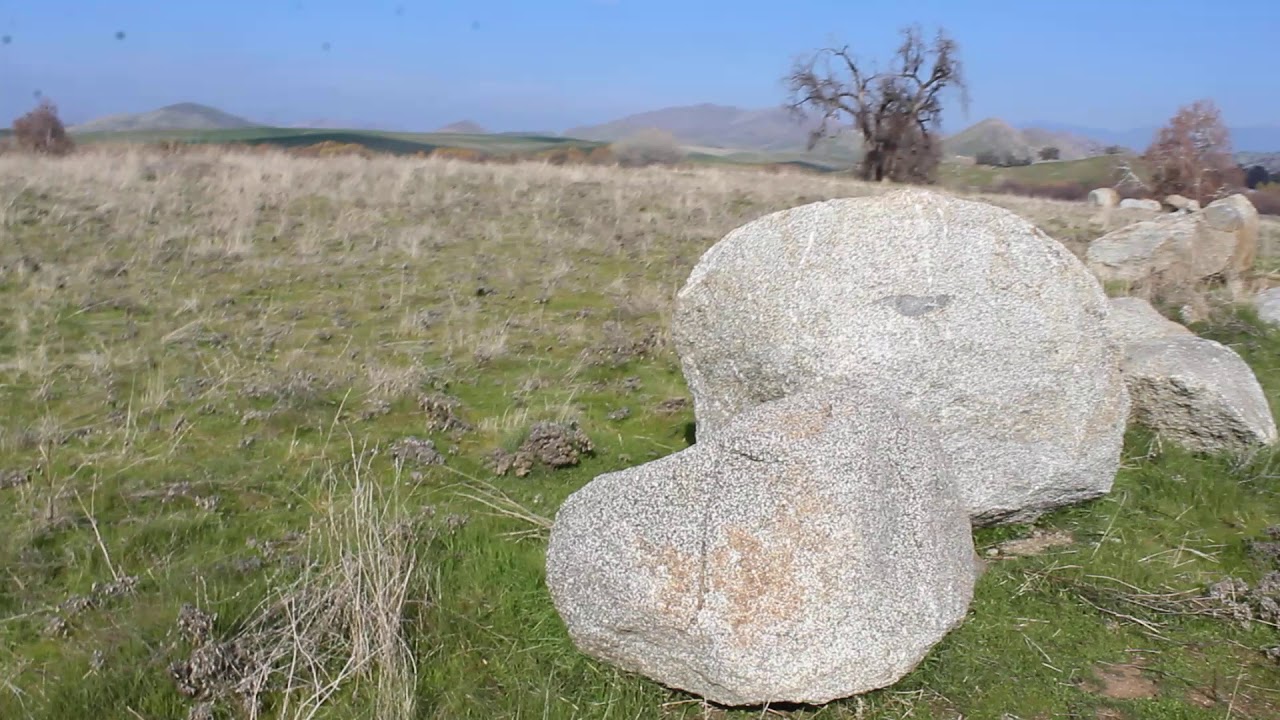 Rustic Gold Granite Boulders - YouTube
