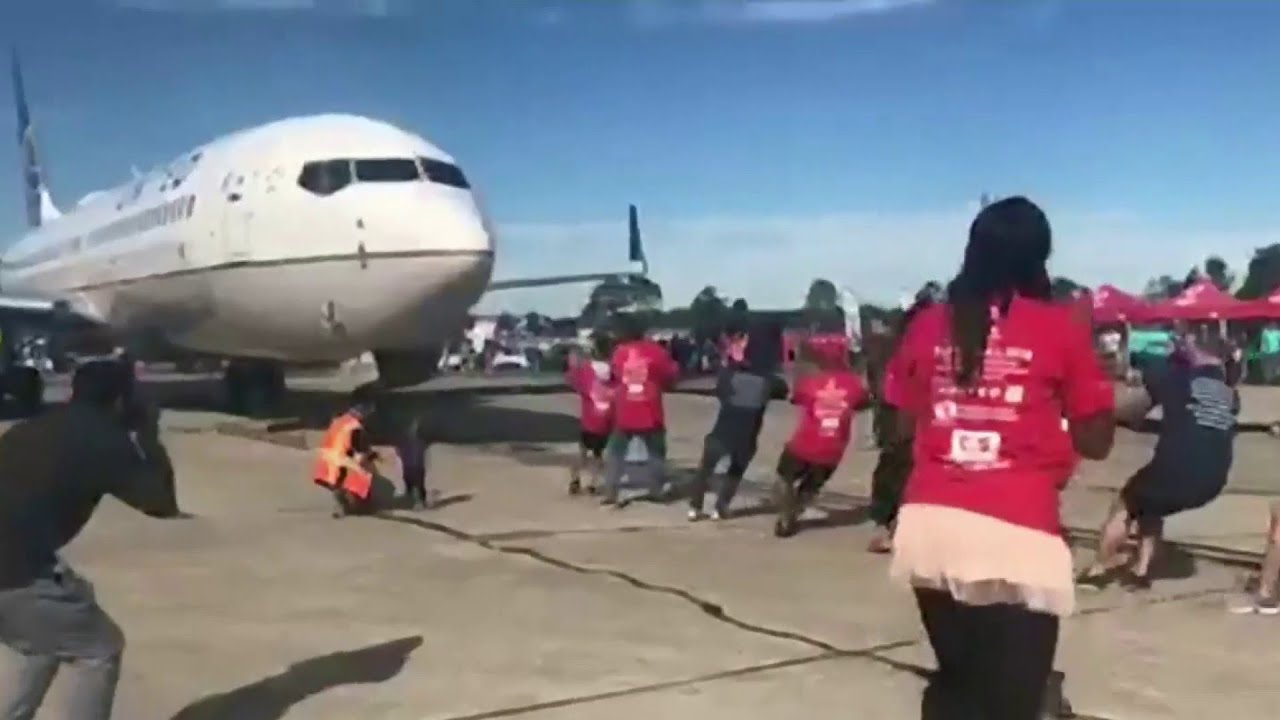 News 6 teams up for plane pull - YouTube
