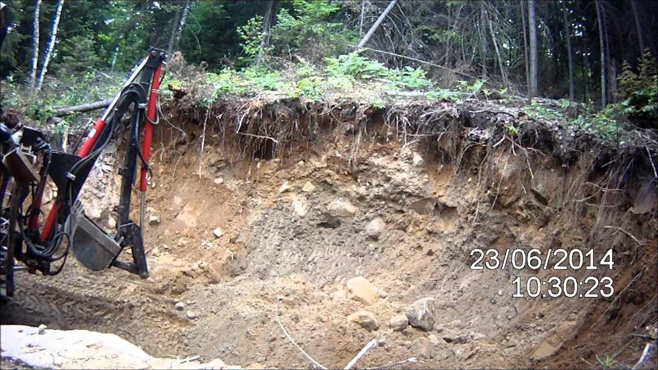 Digging and screening gravel - YouTube