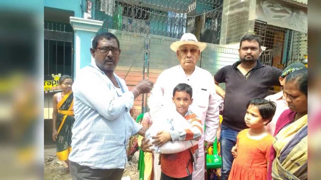 mother earth theme park by parimal dey ration bags distribution to the ...