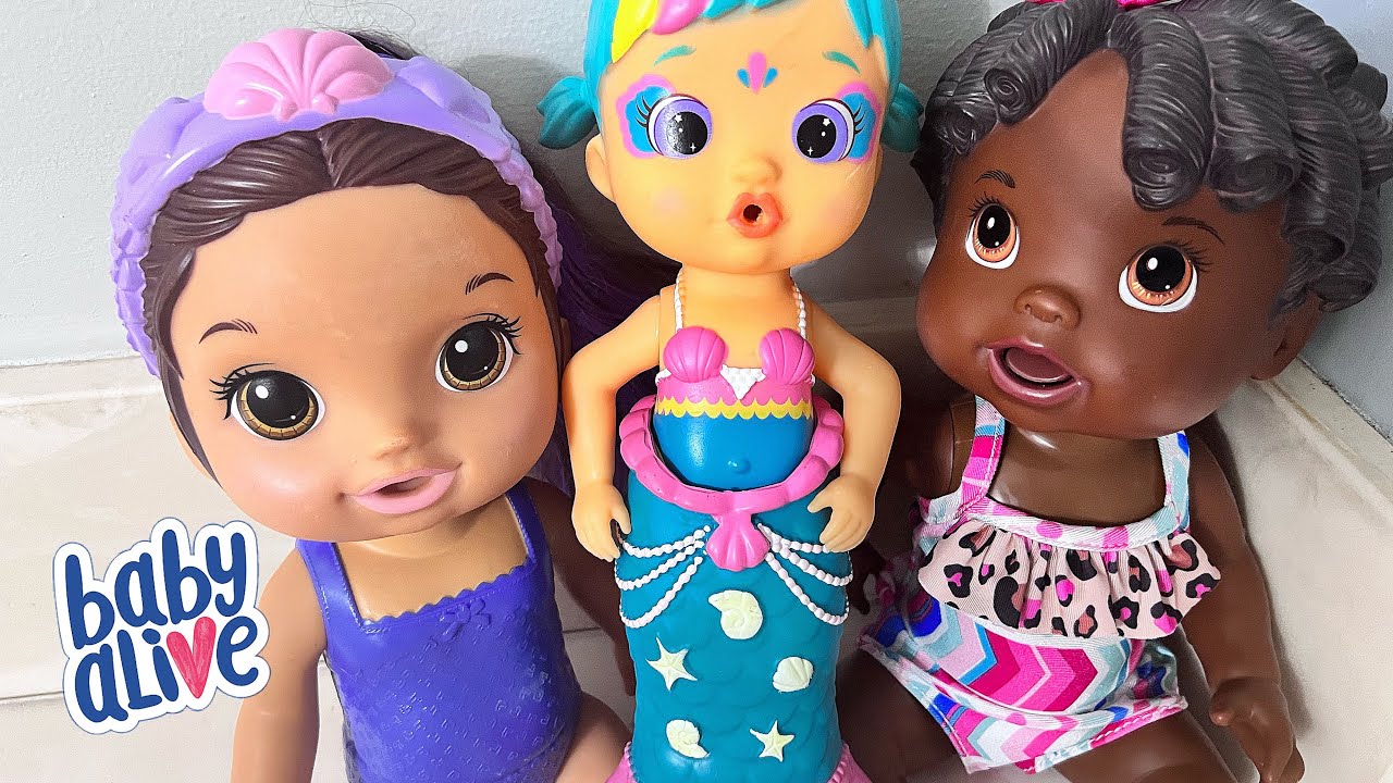 Baby Alive dolls pool time with a Mermaid. The dolls become Junior ...