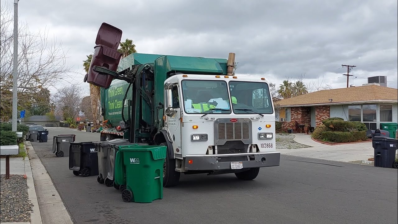 Waste Management Peterbilt 320 Side Loader - YouTube