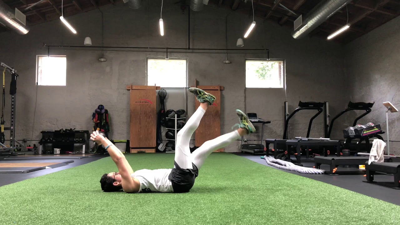 Supine 1KB Overhead Reach with Alternate Leg Lowering - YouTube