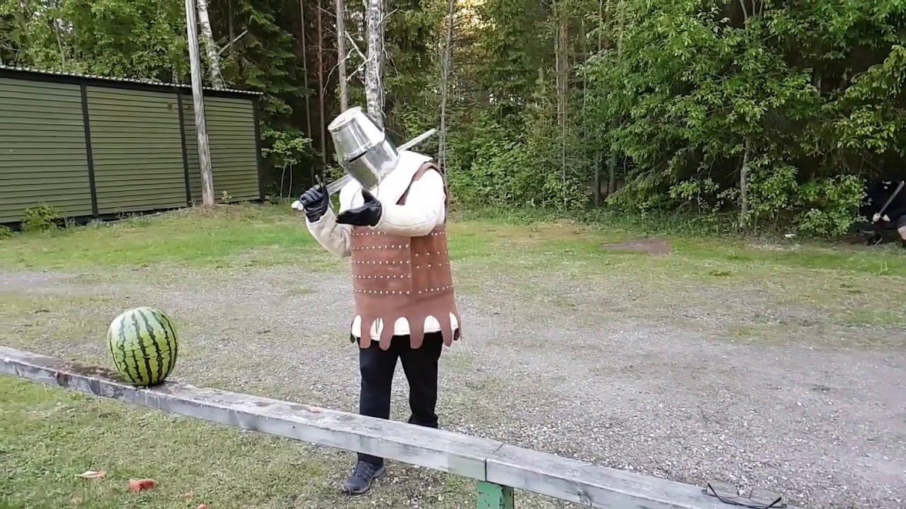 Cutting a watermelon in slow motion with an arming sword - YouTube
