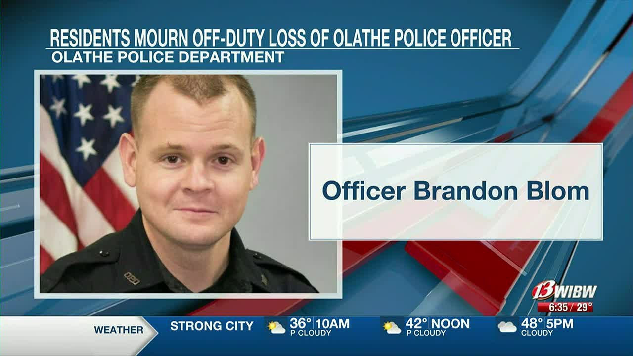 Residents mourn off-duty loss of Olathe Police officer - YouTube