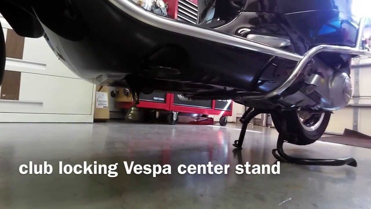 The Club locking Vespa center stand - YouTube