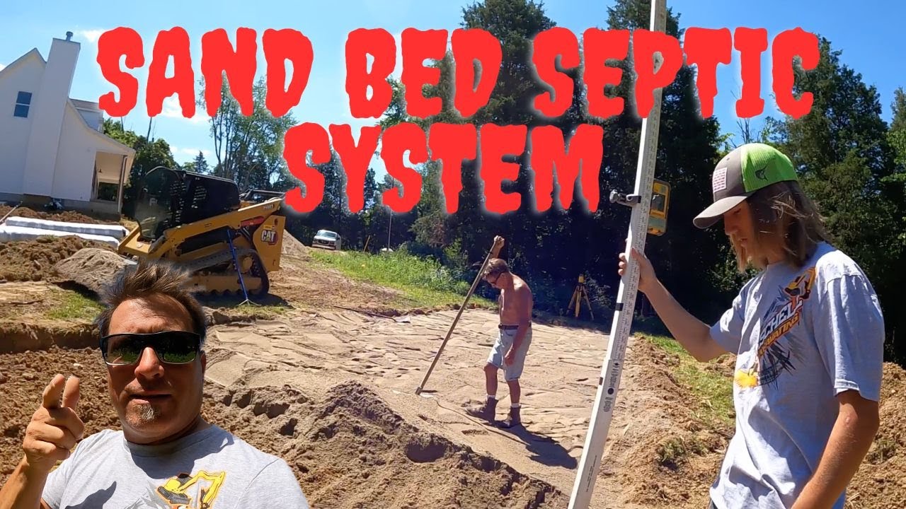 Excavating in the sand bed leach field. Hooking up the ATL pipes ...