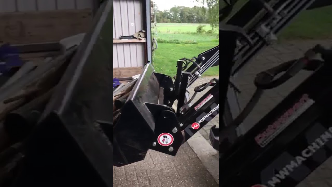 Shibaura ST324 HST moving steel with front loader - YouTube