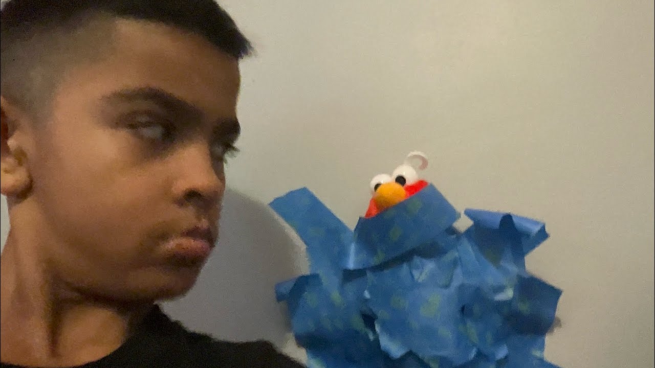 Tapping Elmo to the wall!!! - YouTube