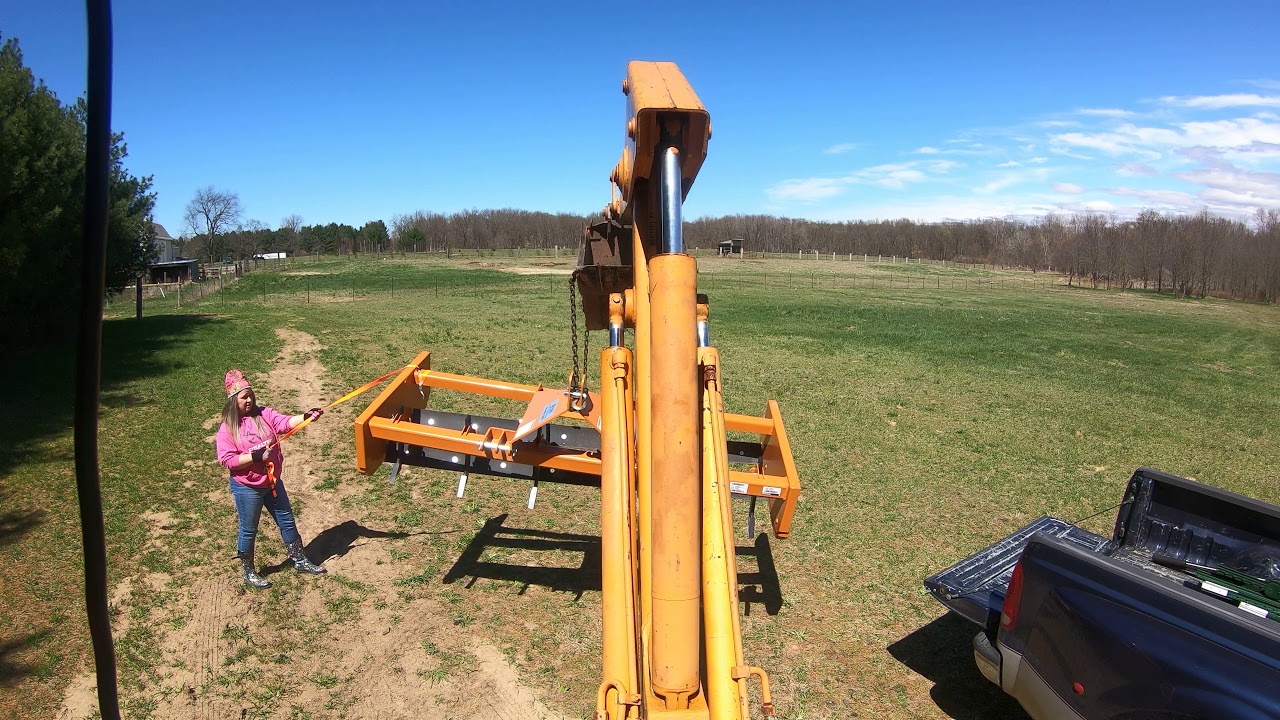 Unloading the Woods GSM96 Grading Scraper - YouTube