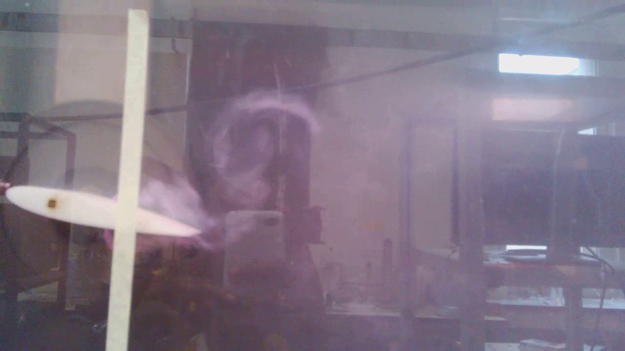 Flow Visualization behind Oscillating foil - YouTube