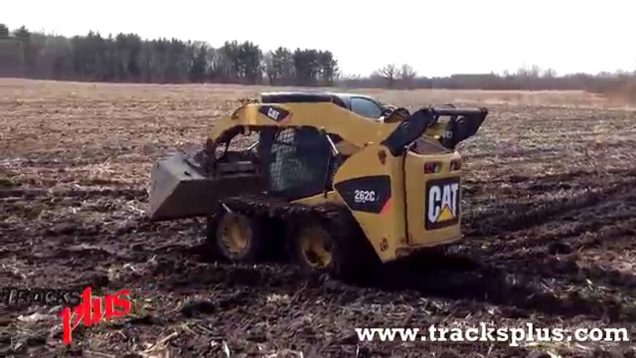 TracksPlus™ Skid Steer Tracks in the Marsh - YouTube