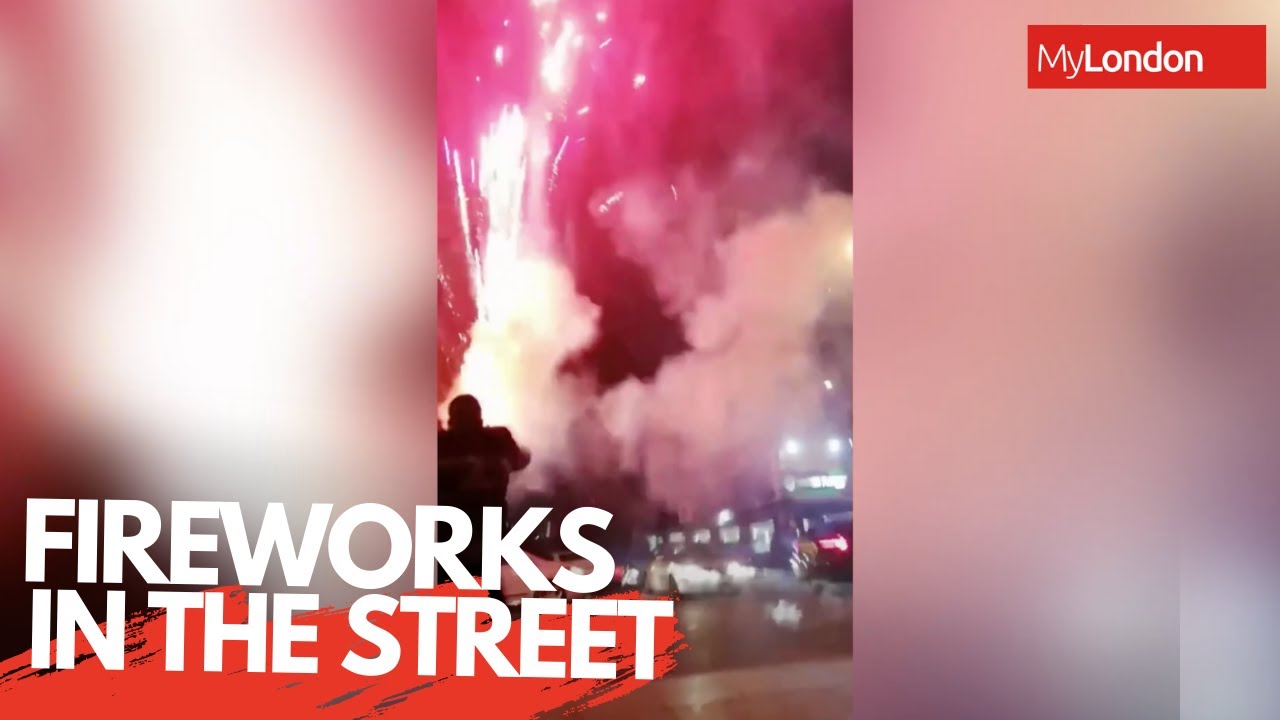 Man shoots fireworks from his hands in West London - YouTube