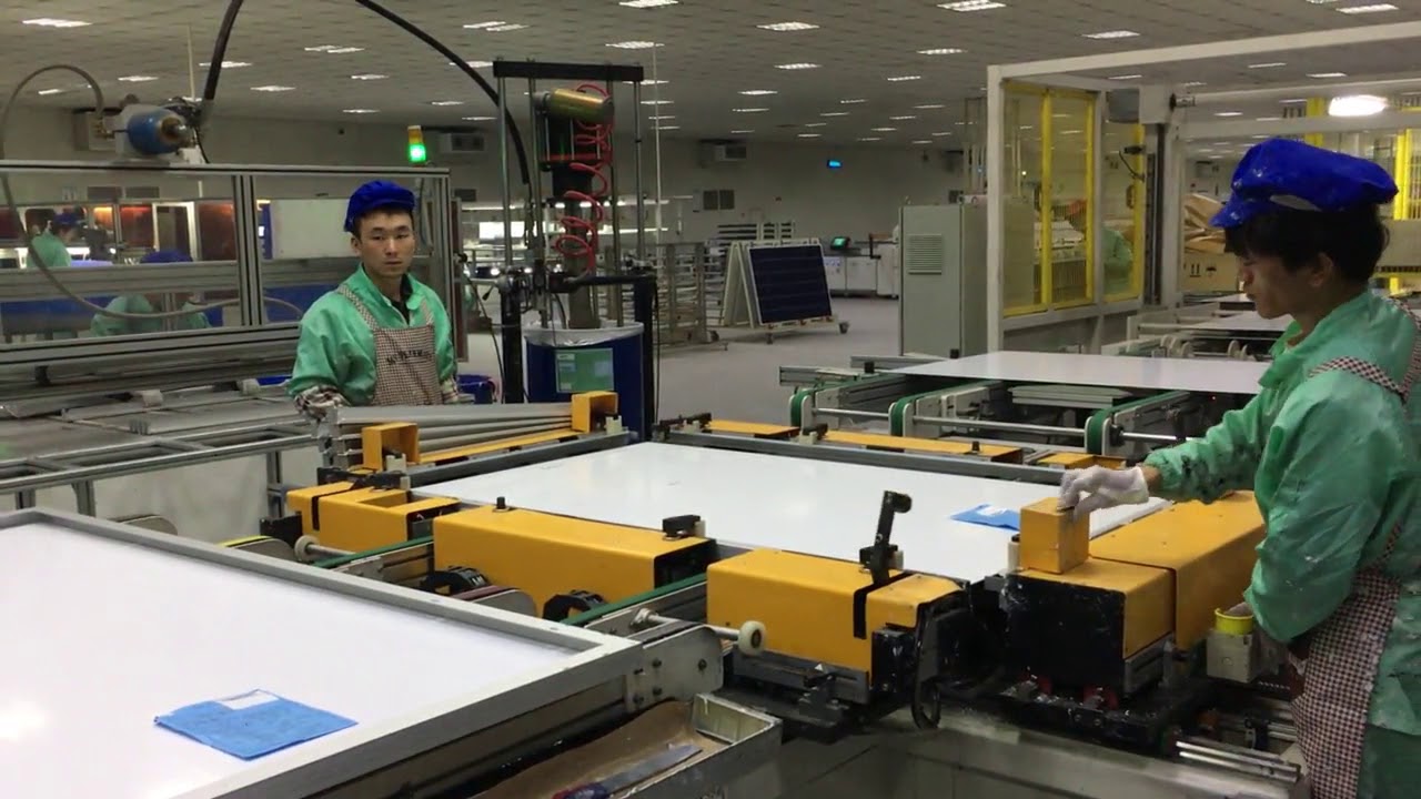 Online automatic framing machine for solar PV modules - YouTube