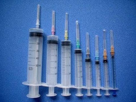 Syringe assembly machine - YouTube