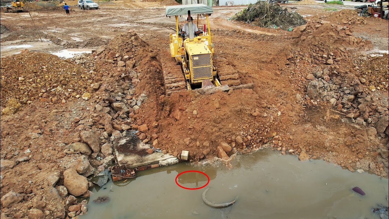 Amazing project landfill Komatsu Dozer Push Soil fill the mud with 5Ton ...