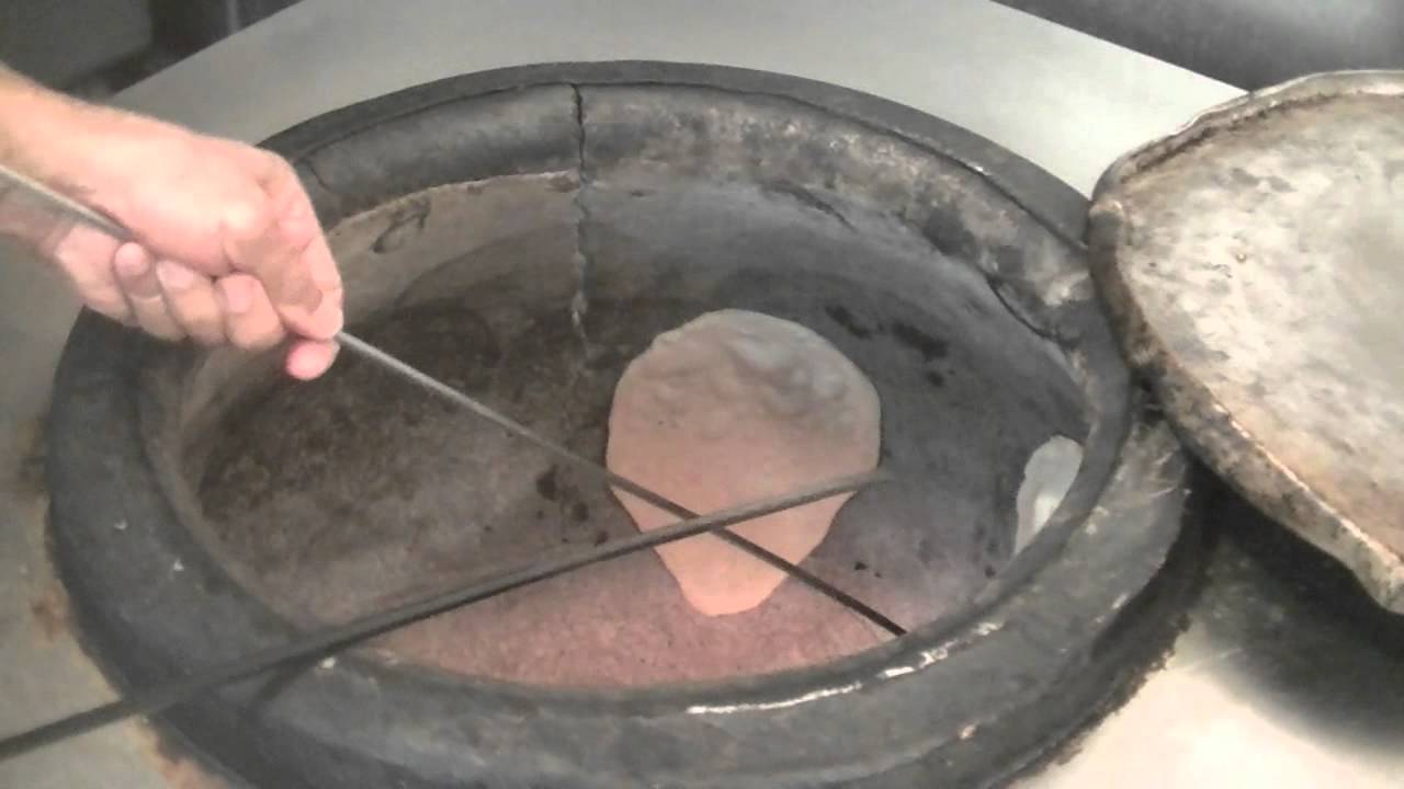 How is Naan made? (in the restaurants) - YouTube
