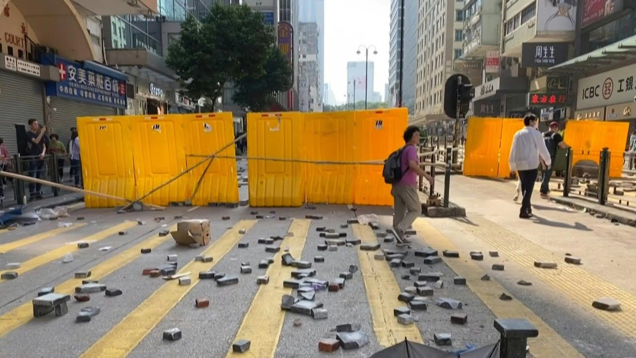 Hong Kong protesters create barricades, place bricks in Kowloon | AFP ...