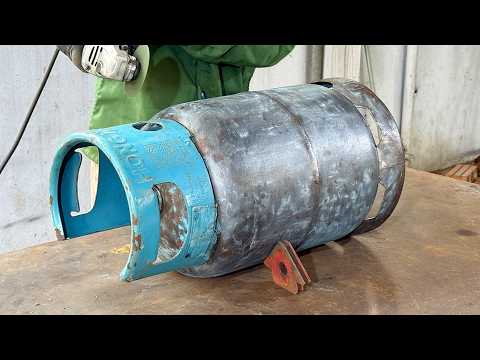 Making a wood-burning stove and grill using an old gas cylinder at home.