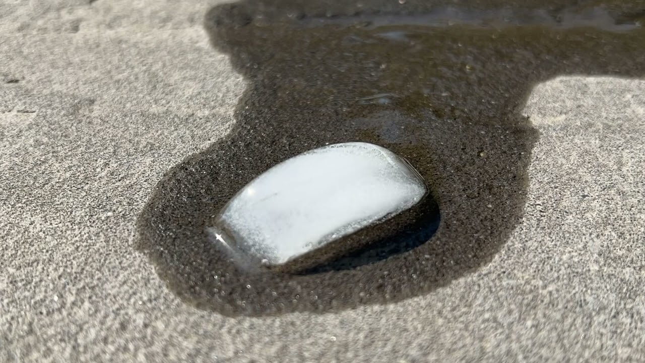 Ice cube melting in hot weather time-lapse - YouTube