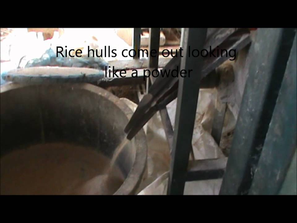 Cleaning rice in Thailand, Removing the hulls from the rice. - YouTube
