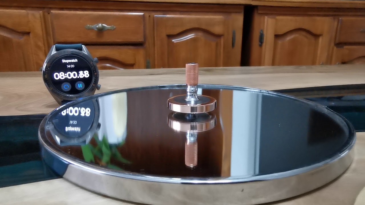 Precision spinning top - YouTube